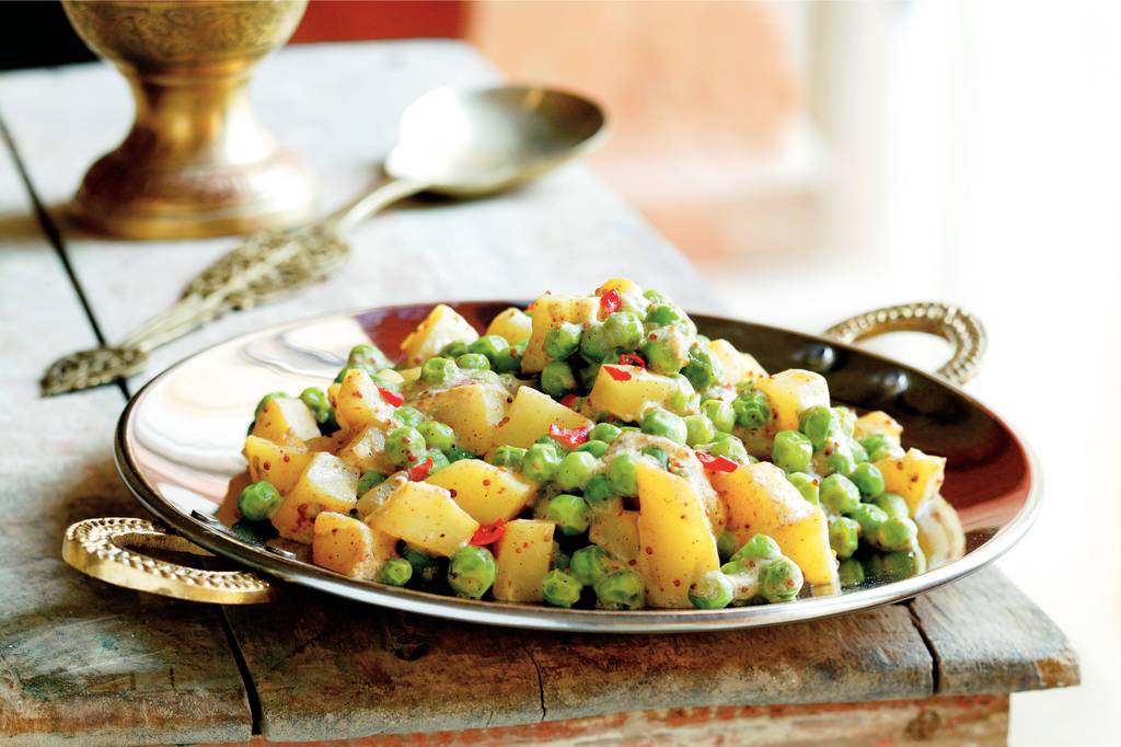 Aardappels en erwten in yoghurtsaus recept - Allerhande | Albert Heijn