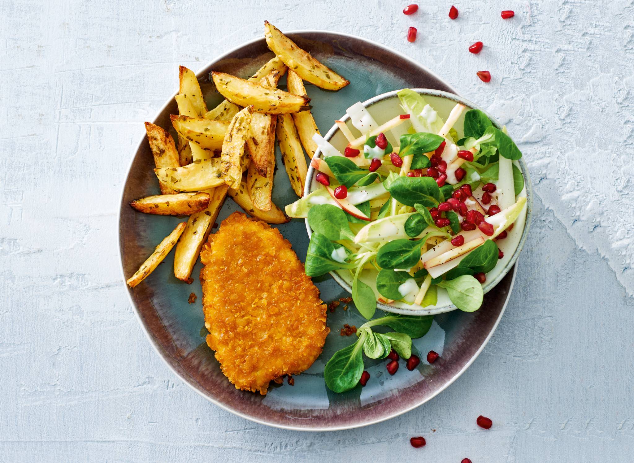 Kipschnitzel met witlofsalade en ovenaardappelen. recept - Allerhande ...